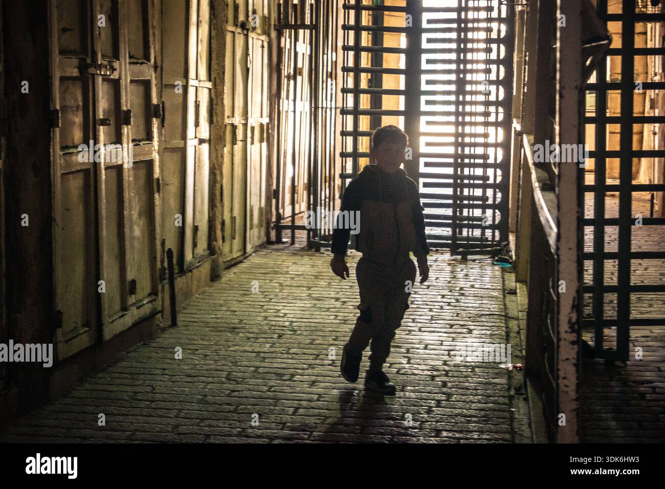 Hebron, West Bank, January 29, 2026 Palestinian child stands near a ...