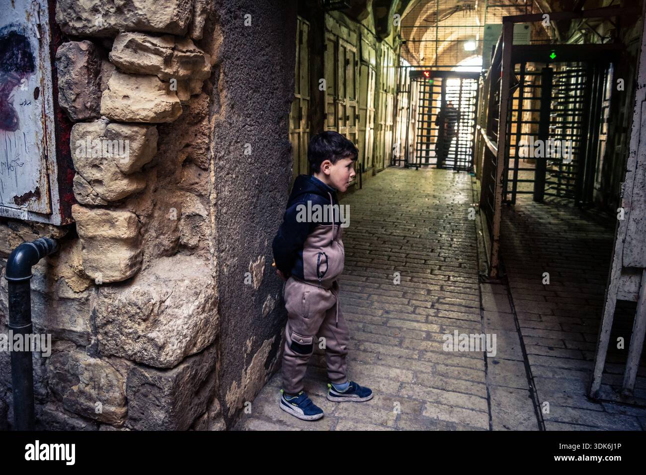 Hebron, West Bank, January 29, 2026 Palestinian child stands near a ...