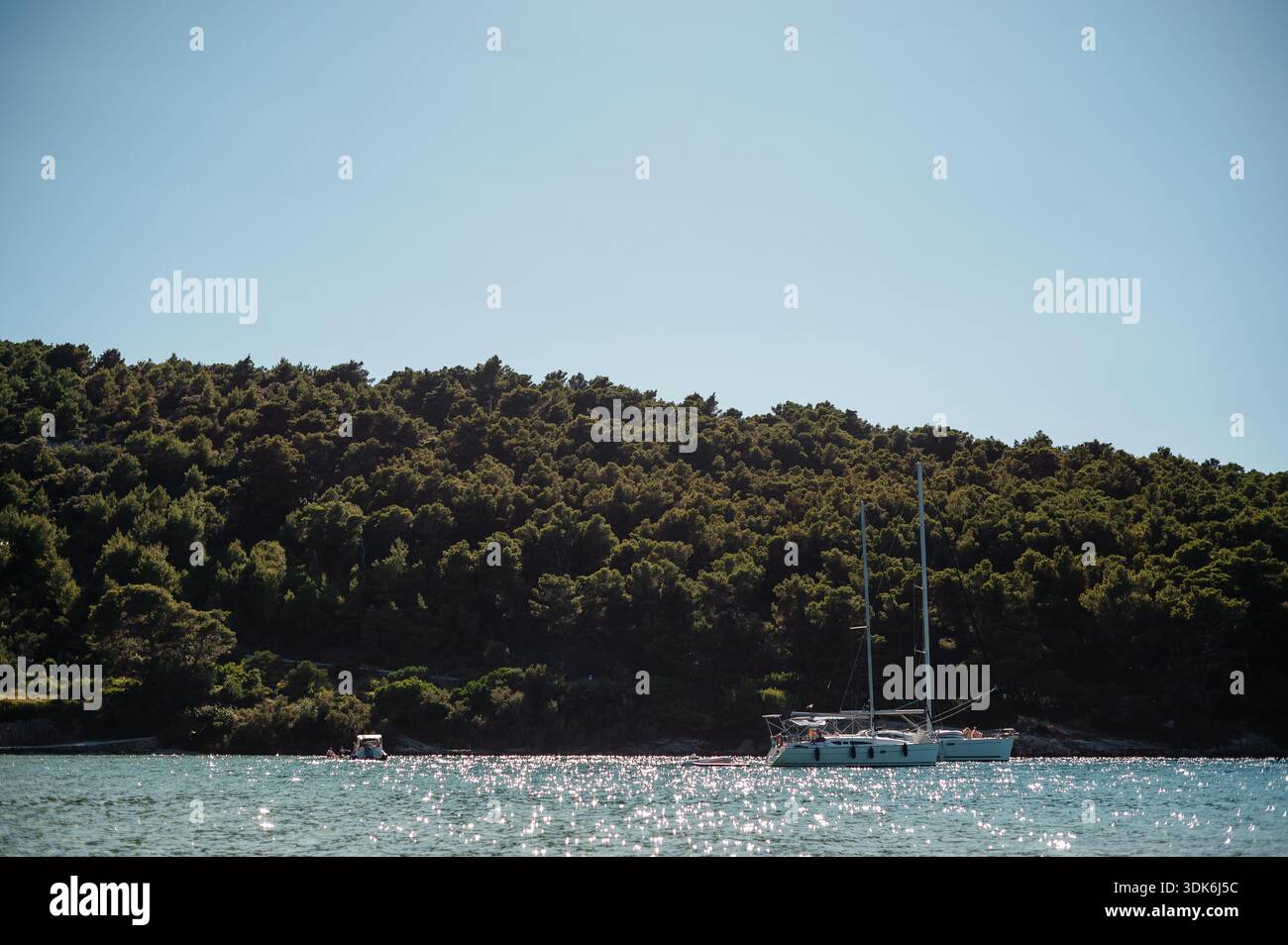 Sailboat on sparkling sea hi-res stock photography and images - Alamy