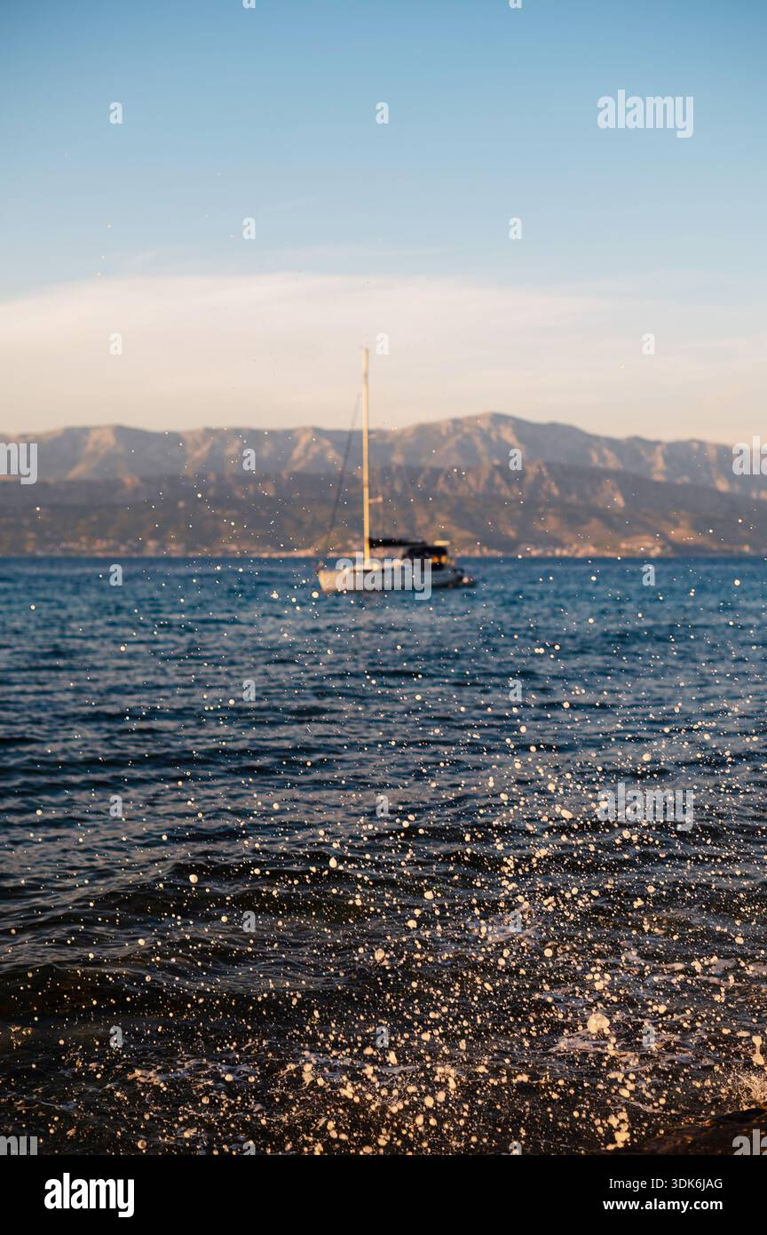 Sailboat on sparkling sea hi-res stock photography and images - Alamy