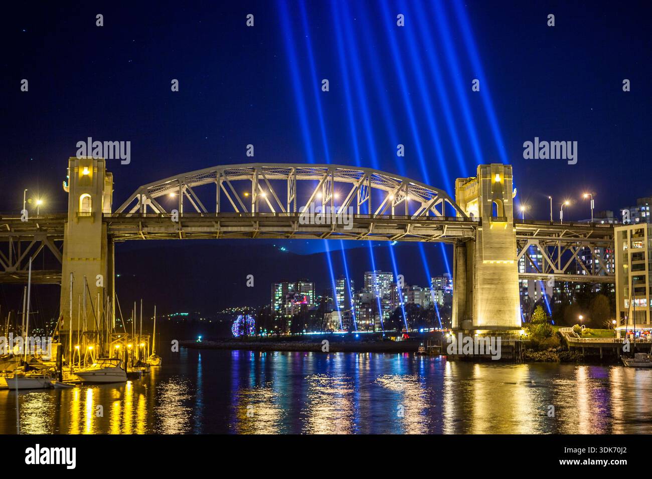 Spotlights lighting up the night sky at Vancouver's West End and ...