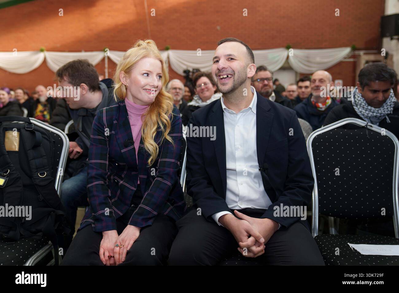 Green Party leader Zack Polanski, right, sits with the party candidate ...