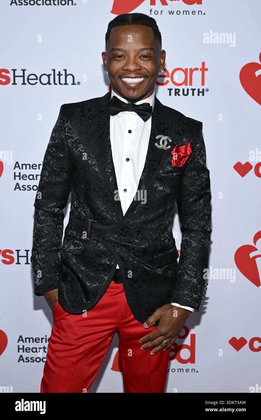 Marco Hall attends the American Heart Association's Red Dress ...