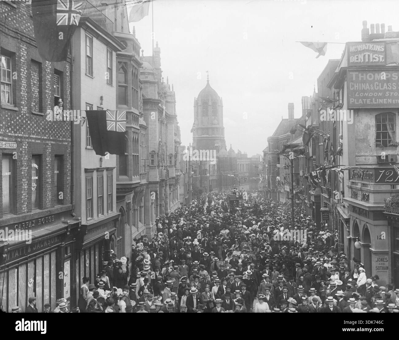 Street scene showing crowds outside the Town Hall celebrating the ...
