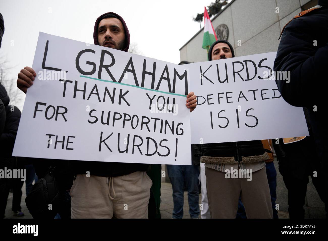 Kurdish nationals rally near the US embassy in Warsaw, Poland on 30 ...