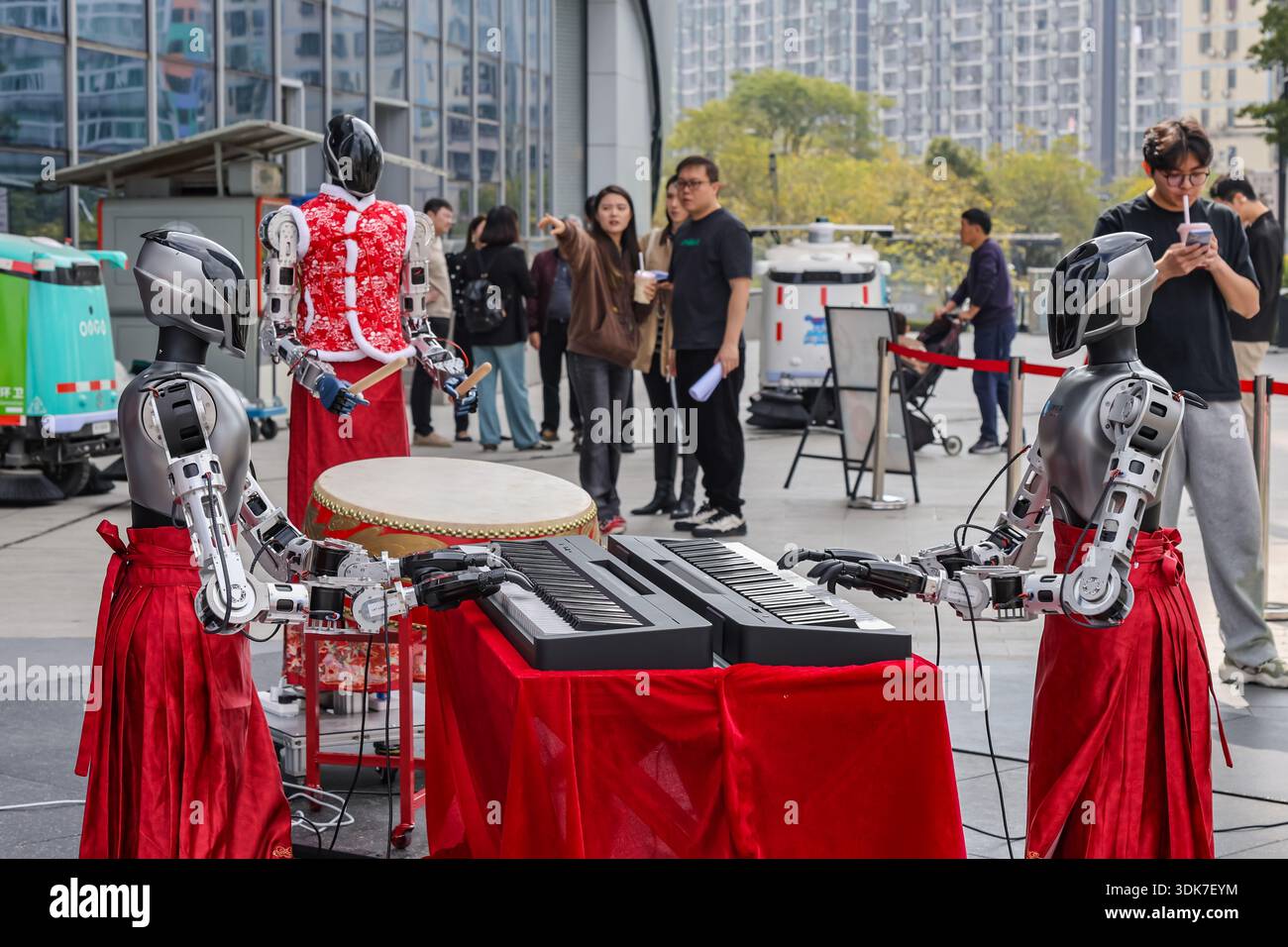 Humanoids made by Linkerbot, a Chinese robotics startup, perform as a ...