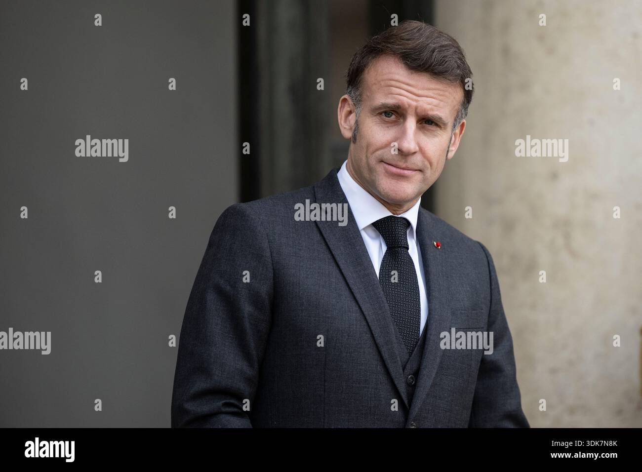 France's President Emmanuel Macron looks and gestures at the Elysee ...