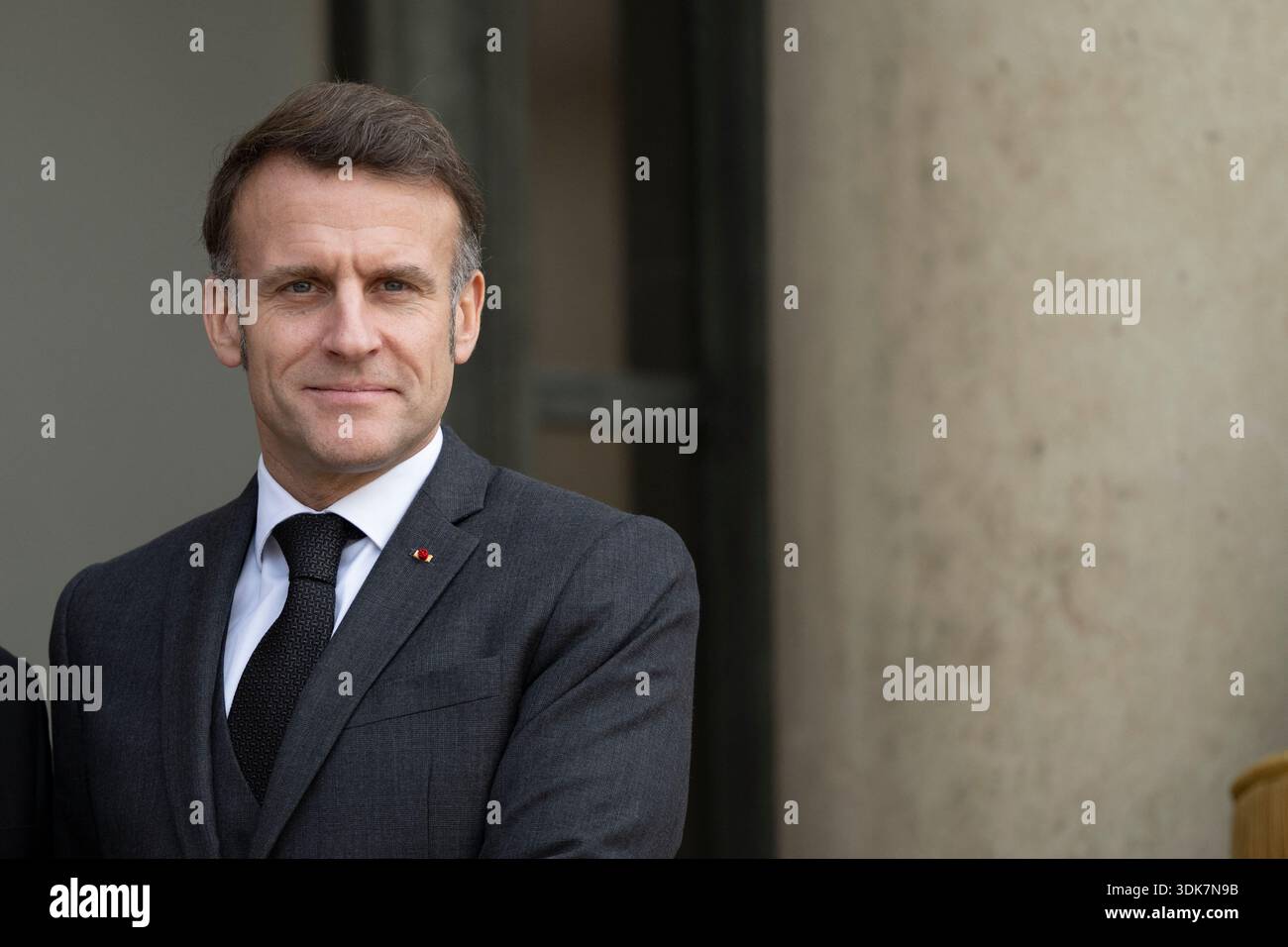 France's President Emmanuel Macron looks and gestures at the Elysee ...