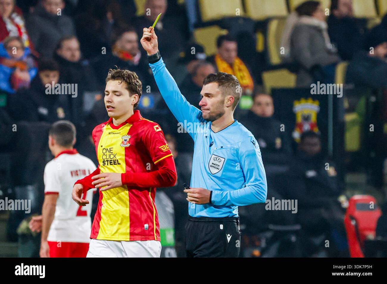 referee Willy Delajod shows a yellow card during the UEFA Europa League ...