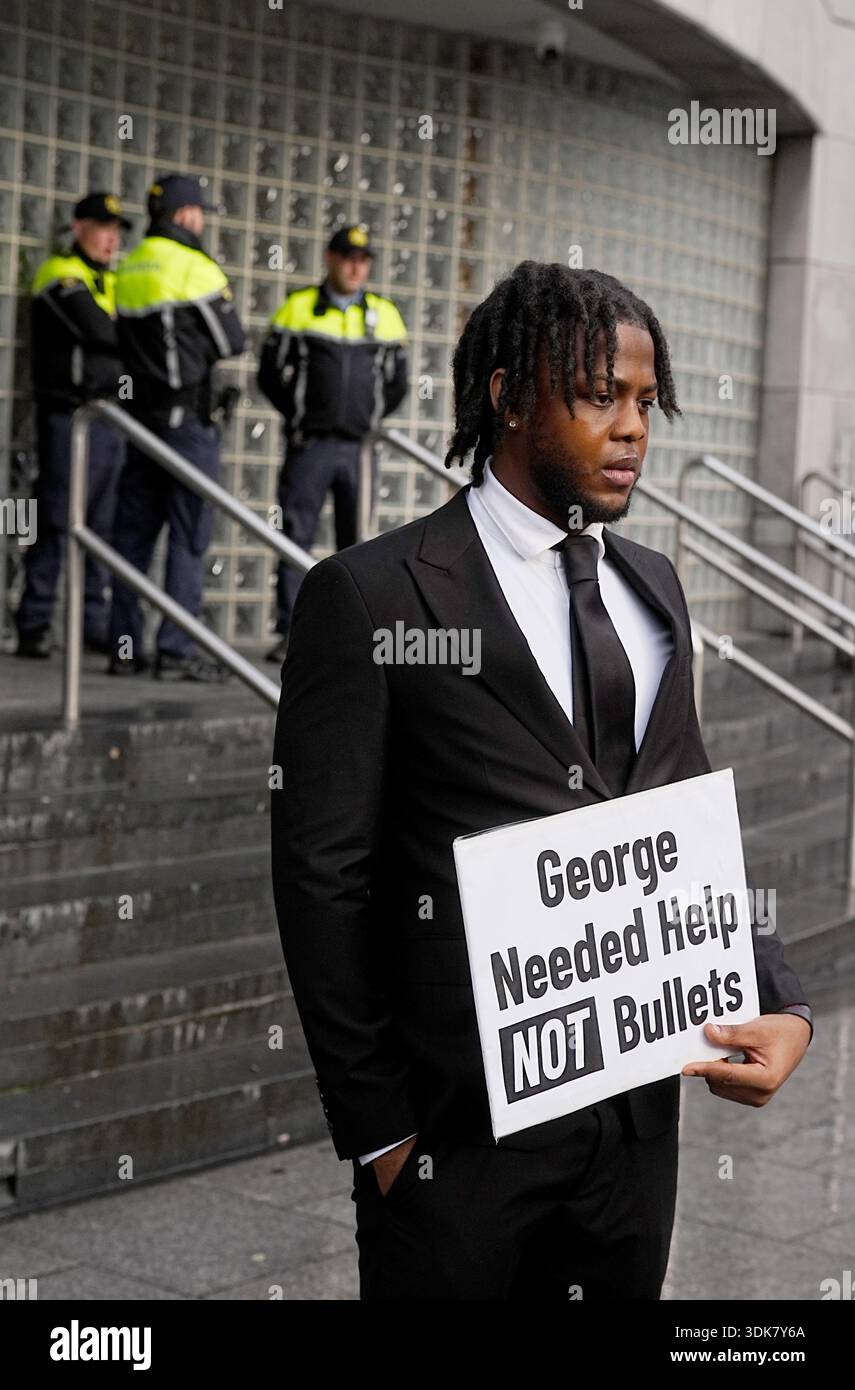 Victor, the brother of George Nkencho, joins a protest outside the ...