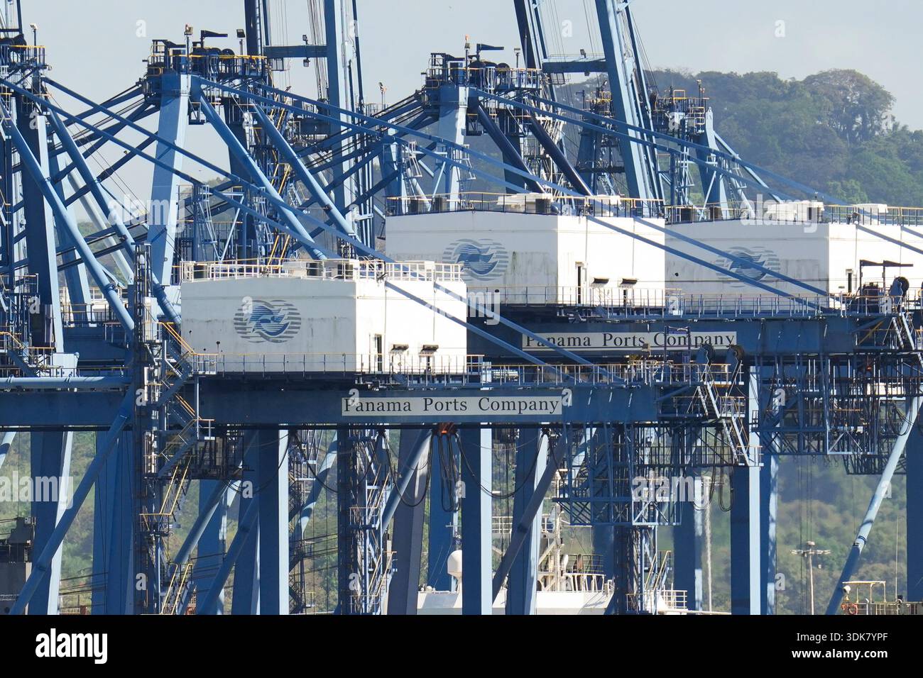 Cranes load a cargo ship at Panama Canal's Port of Balboa, managed by ...