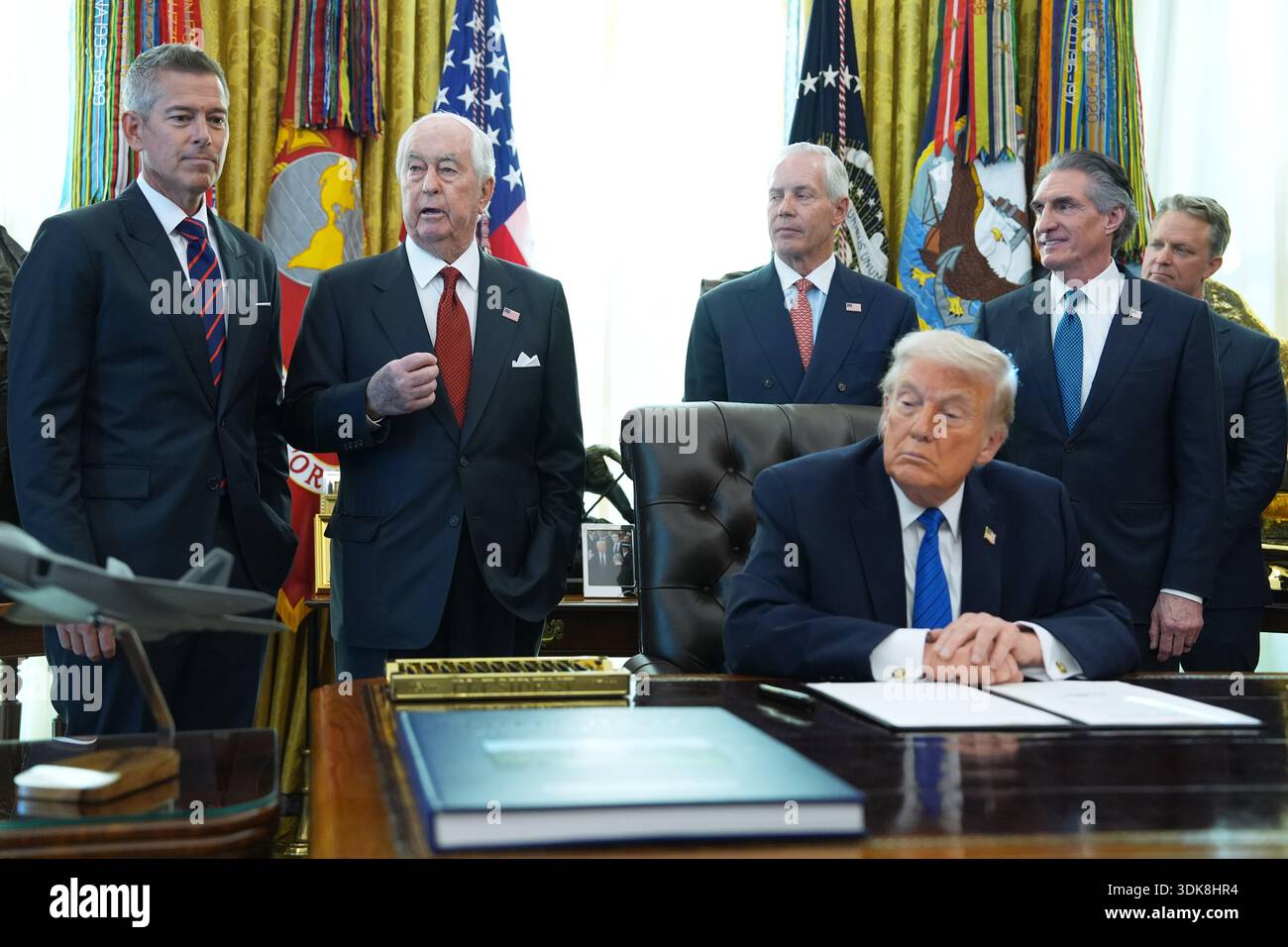 Roger Penske, second left, speaks before President Donald Trump signs ...