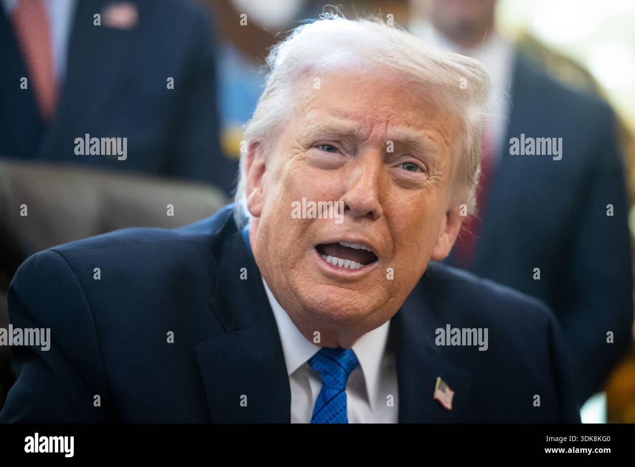 President Donald Trump signs executive orders in the Oval Office at the ...