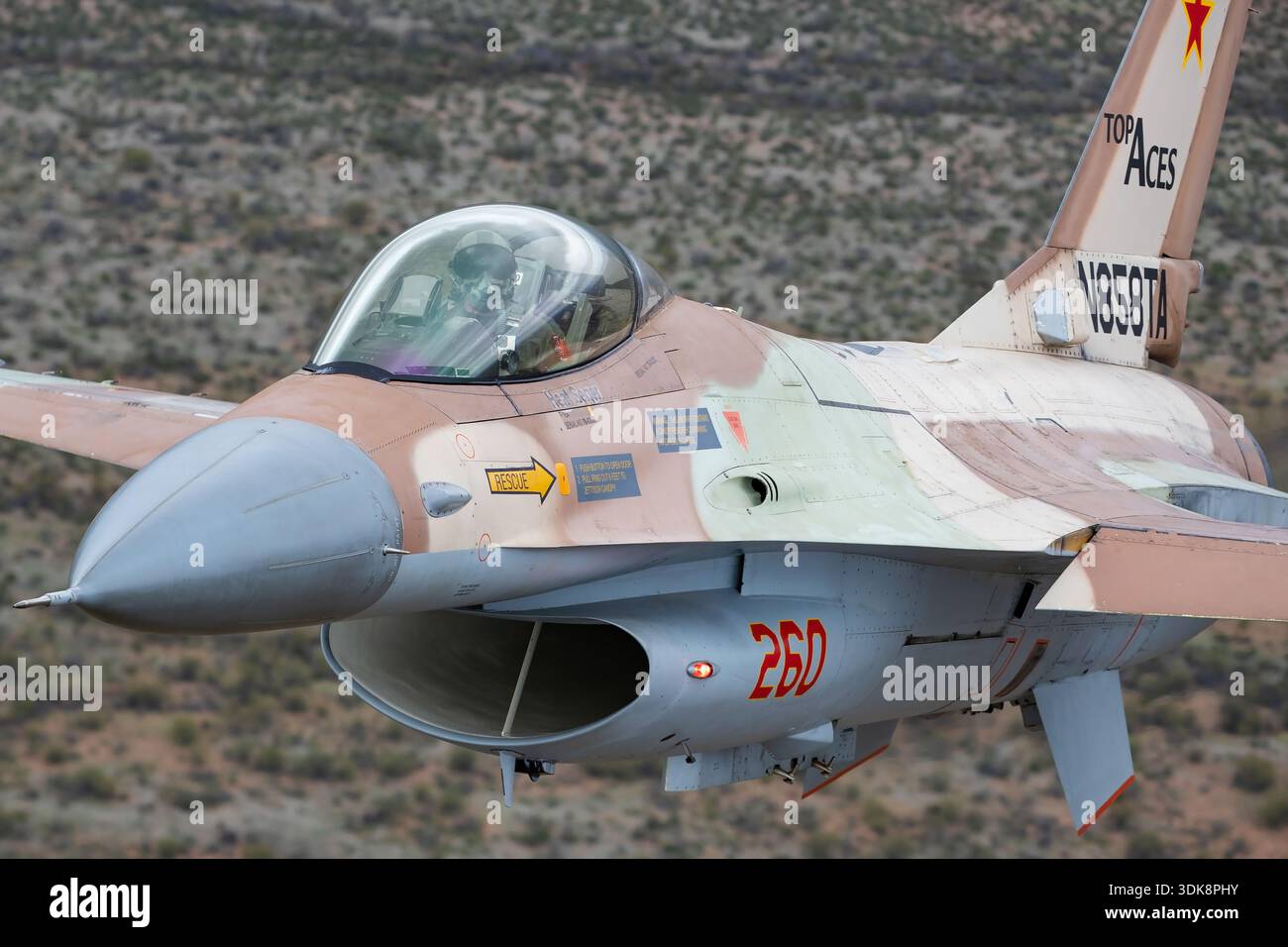 A General Dynamics F-16A Netz flown by Top Aces is photographed in air ...