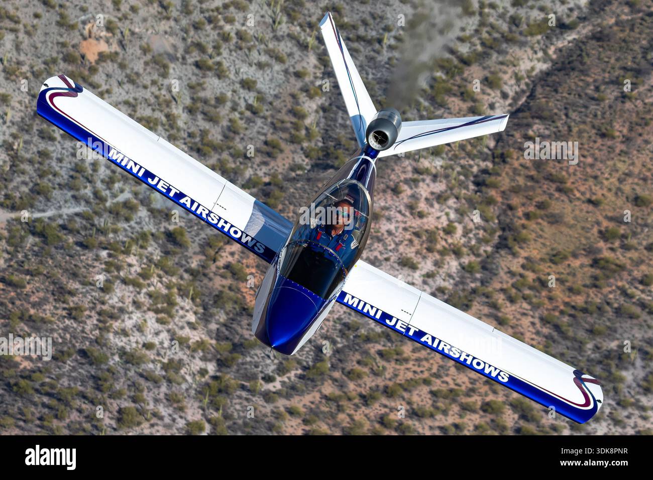 The image shows a Sonex JSX-2 SubSonex in flight during air-to-air ...