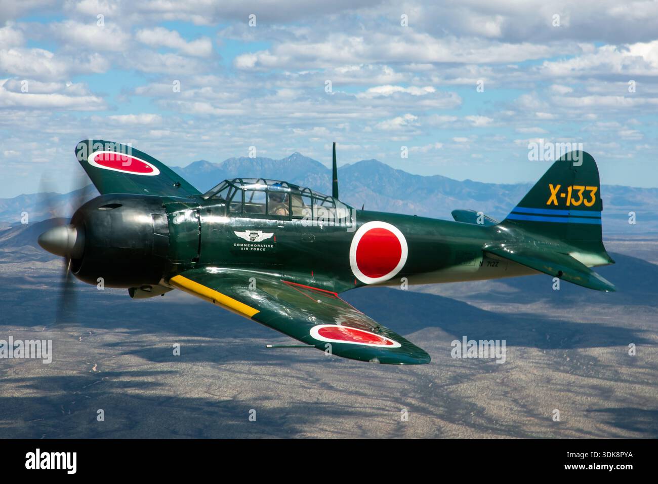 A Mitsubishi A6M3 Reisen, commonly known as the Zero, flies in air-to ...