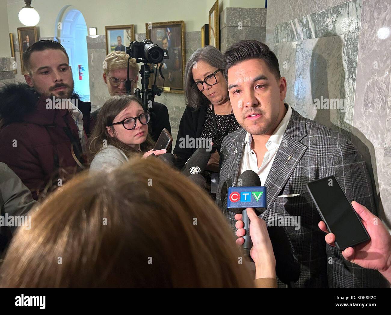 Lesser Slave Lake MLA Scott Sinclair, right, speaks with members of the ...