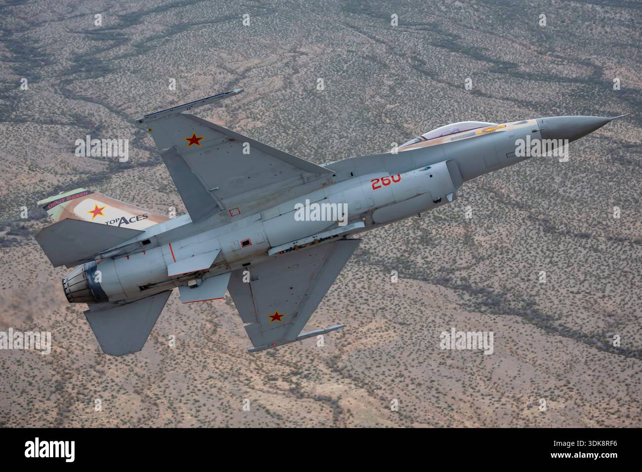 A General Dynamics F-16A Netz of Top Aces banks during air-to-air ...