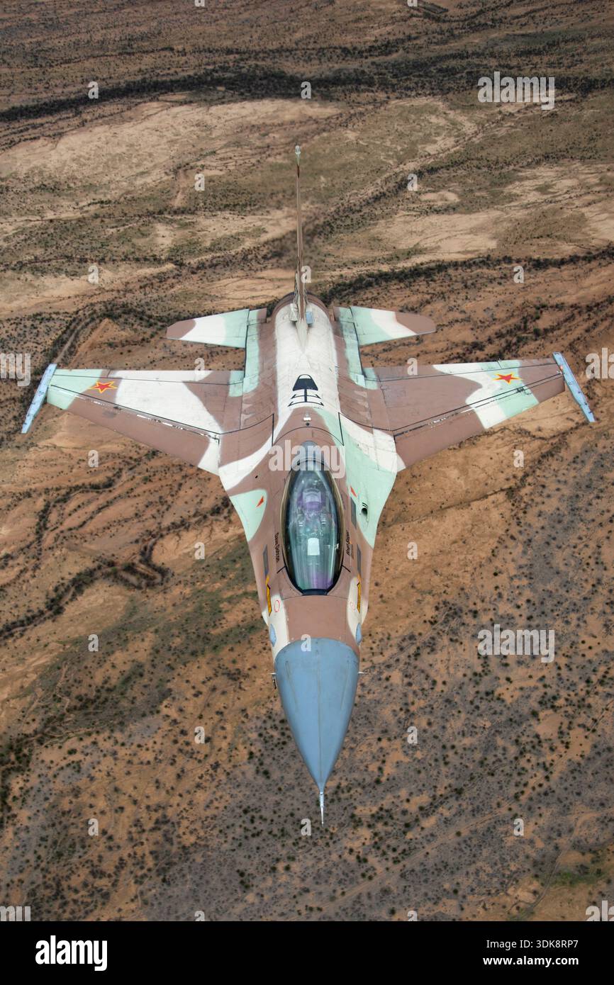 The F-16A Netz, N858TA, serial 6V-45, flies overhead near Luke Air ...