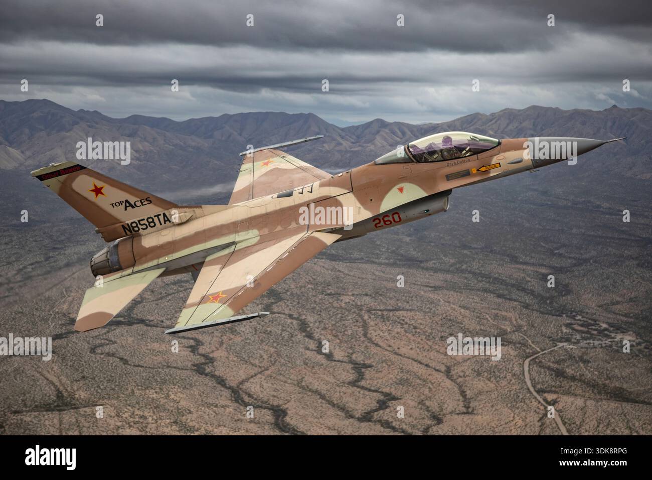The photograph features a General Dynamics F-16A Netz flown by Top Aces ...