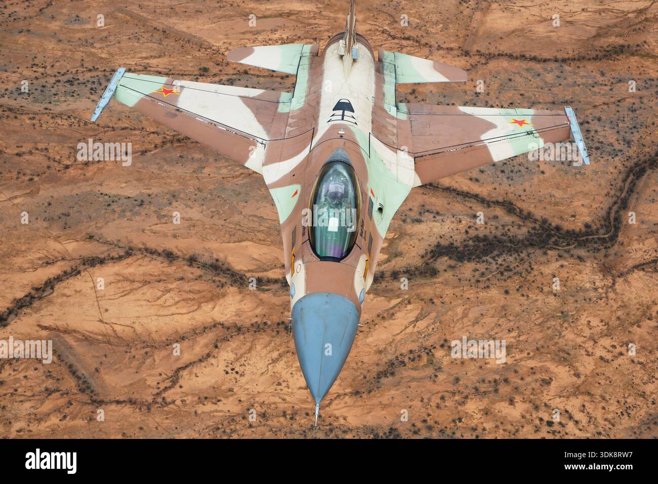 A General Dynamics F-16A Netz flies overhead near Luke Air Force Base ...