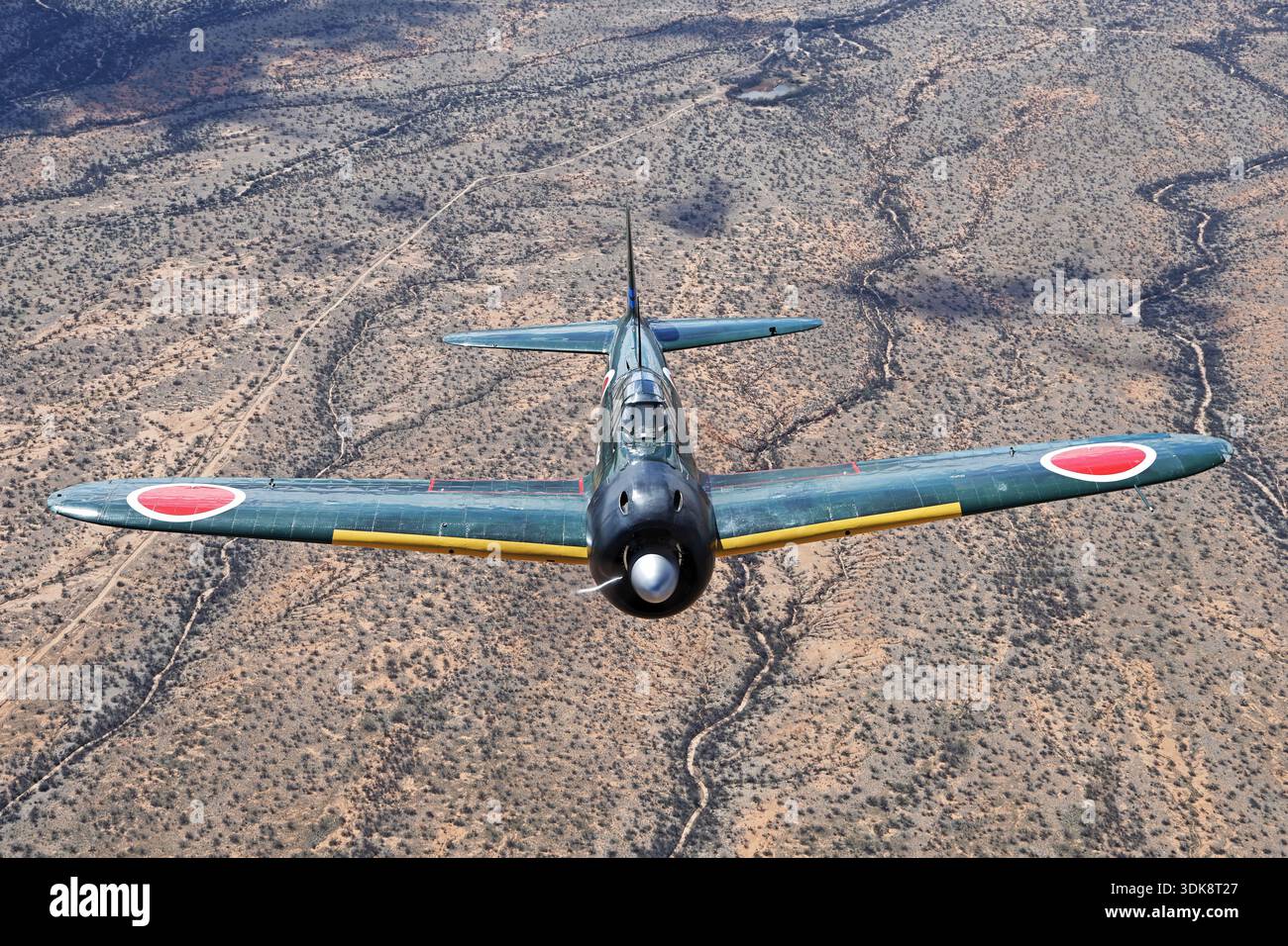 A Mitsubishi A6M3 Reisen, known as the Zero, is captured in air-to-air ...
