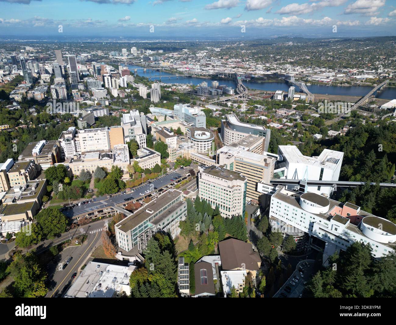 Aerial view of OHSU hilltop hospital campus with downtown Portland in ...
