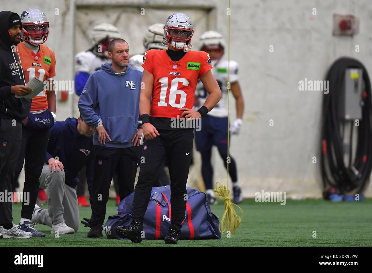 New England Patriots quarterback Tommy DeVito (16) warms up during an ...