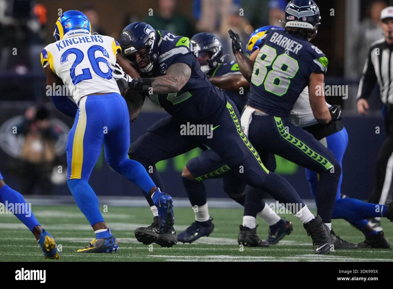 Seattle Seahawks offensive tackle Abraham Lucas (72) tackles Los ...