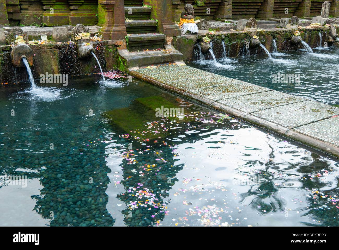 Holy water fountains at Tirta Empul Temple in Bali, Indonesia Stock ...
