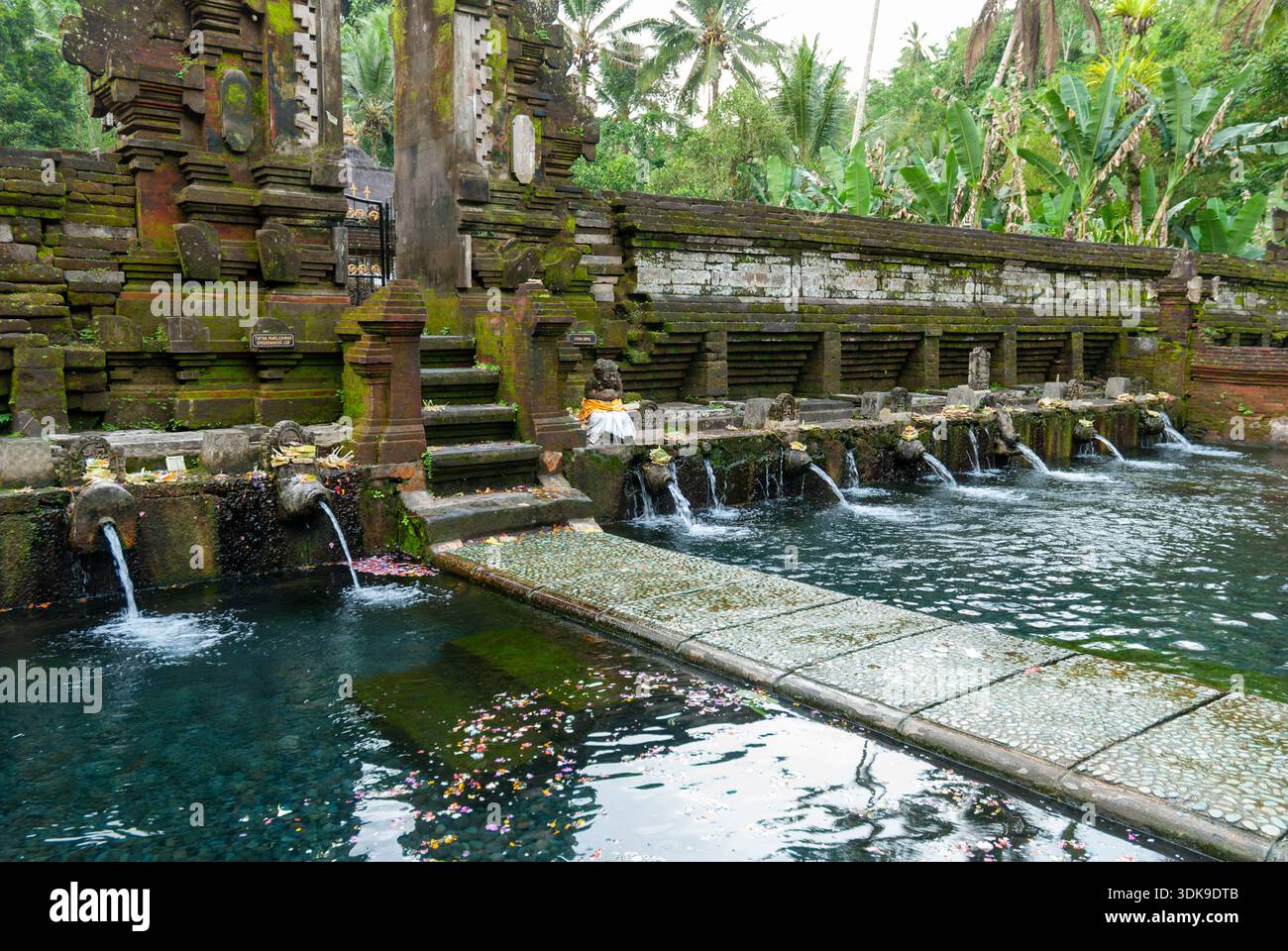 Holy water fountains at Tirta Empul Temple in Bali, Indonesia Stock ...