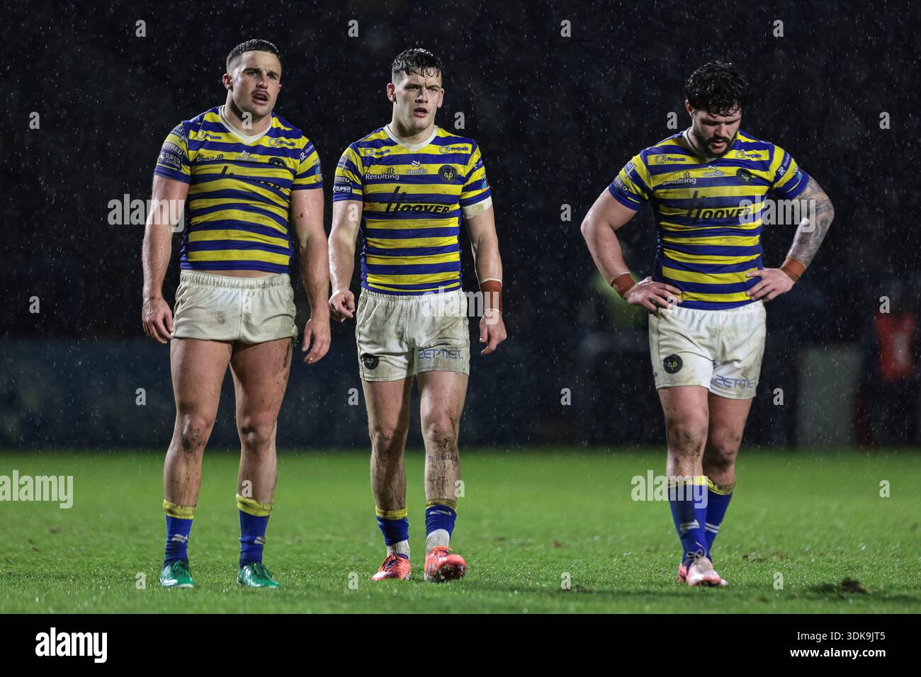 Josh Smith of Warrington Wolves, Josh Thewlis of Warrington Wolves and ...