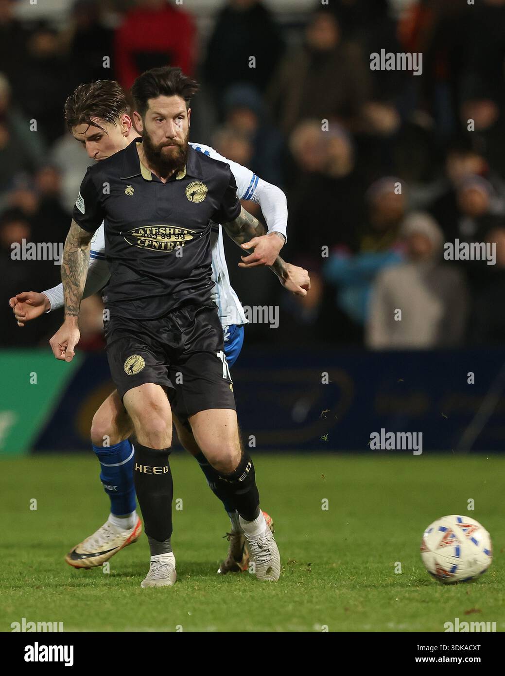 Gateshead's Jacob Butterfield in action with Jay Benn of Hartlepool ...