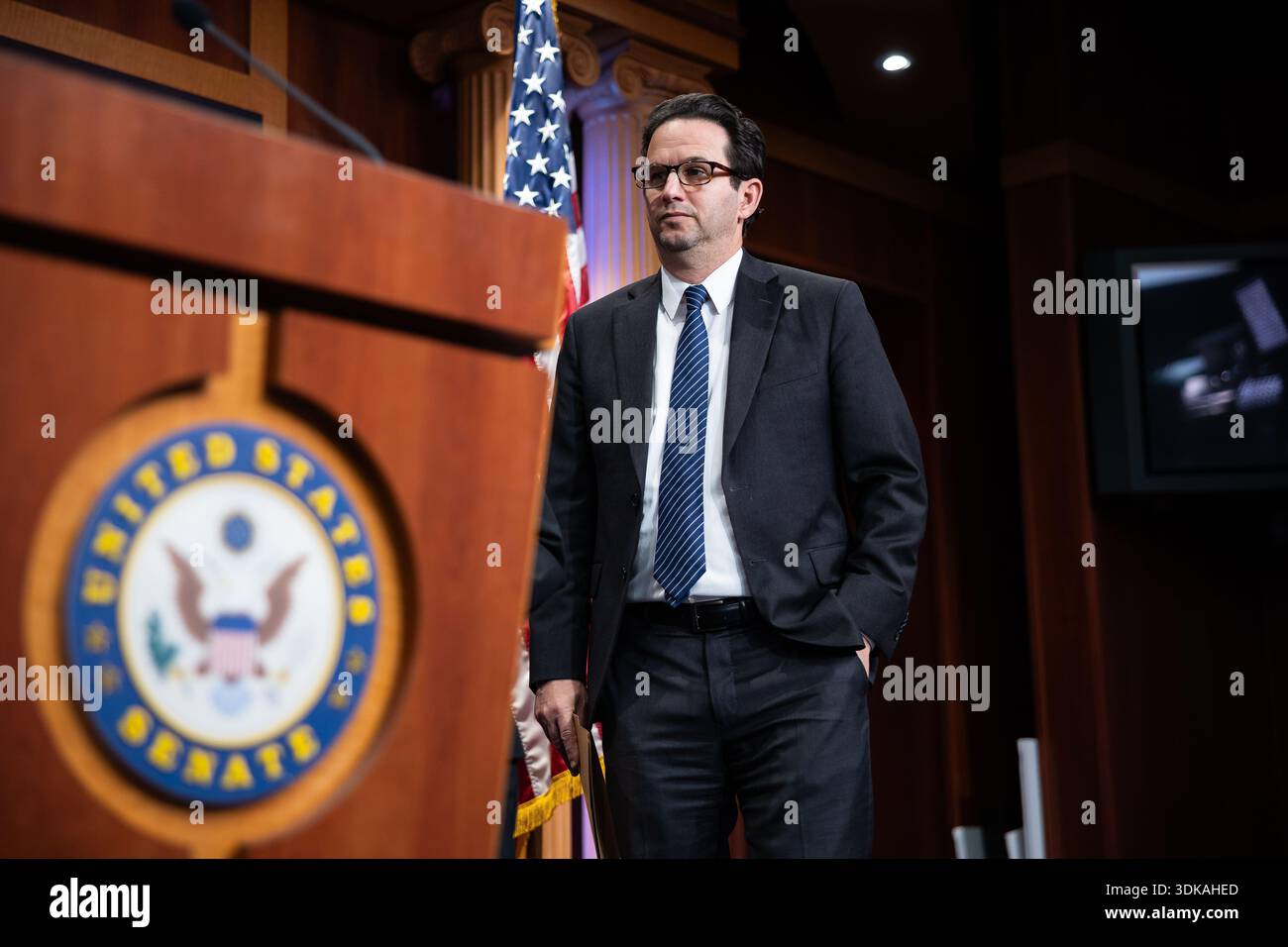 Sen. Brian Schatz (D-Hawaii) looks on during a press conference at the ...