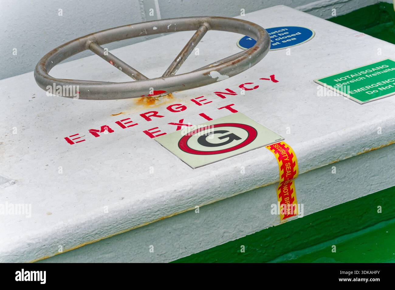 Metal hatch labeled emergency hi-res stock photography and images - Alamy