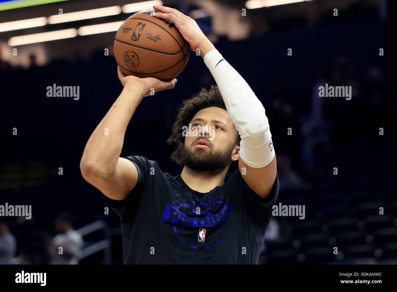 Detroit Pistons guard Cade Cunningham warms up before an NBA basketball ...
