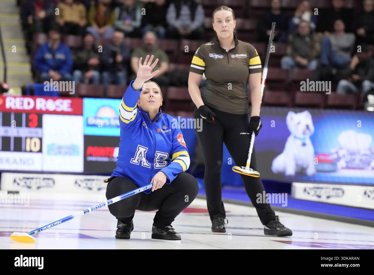 Alberta-Sturmay's Selena Sturmay guides her stone as Manitoba-Peterson ...