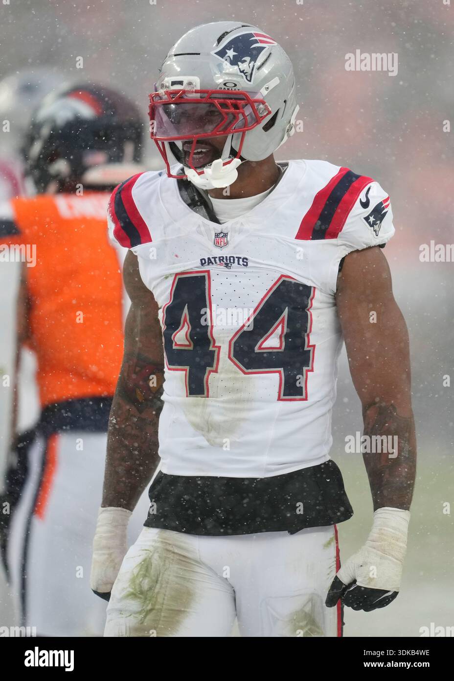 New England Patriots linebacker K'lavon Chaisson walks on the field ...