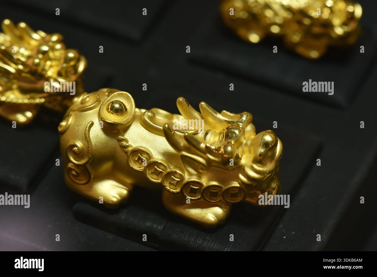 Gold jewelry being photographed in a gold shop in Fuyang City, Anhui ...