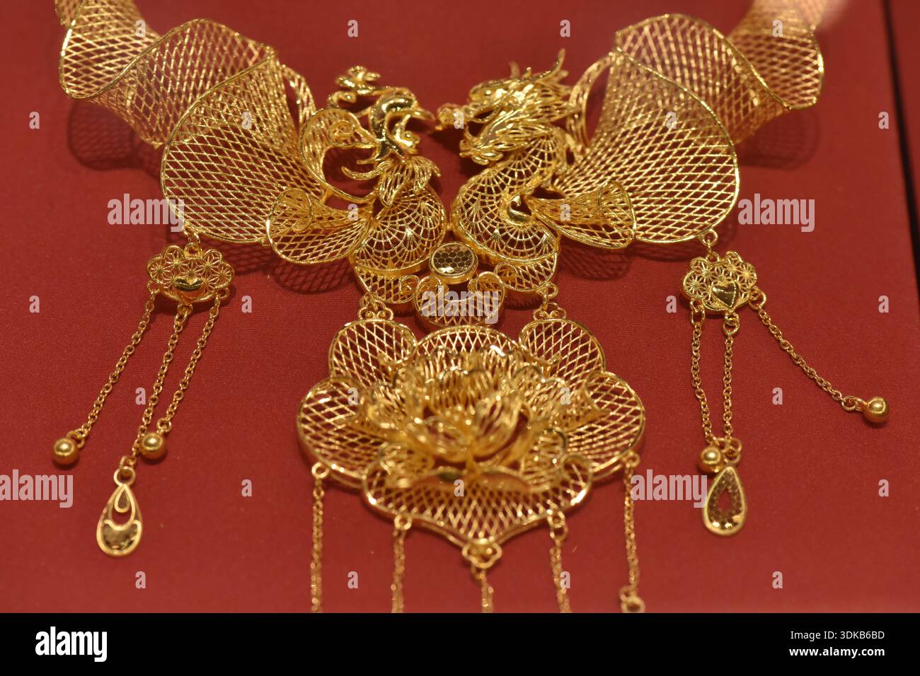 Gold jewelry being photographed in a gold shop in Fuyang City, Anhui ...