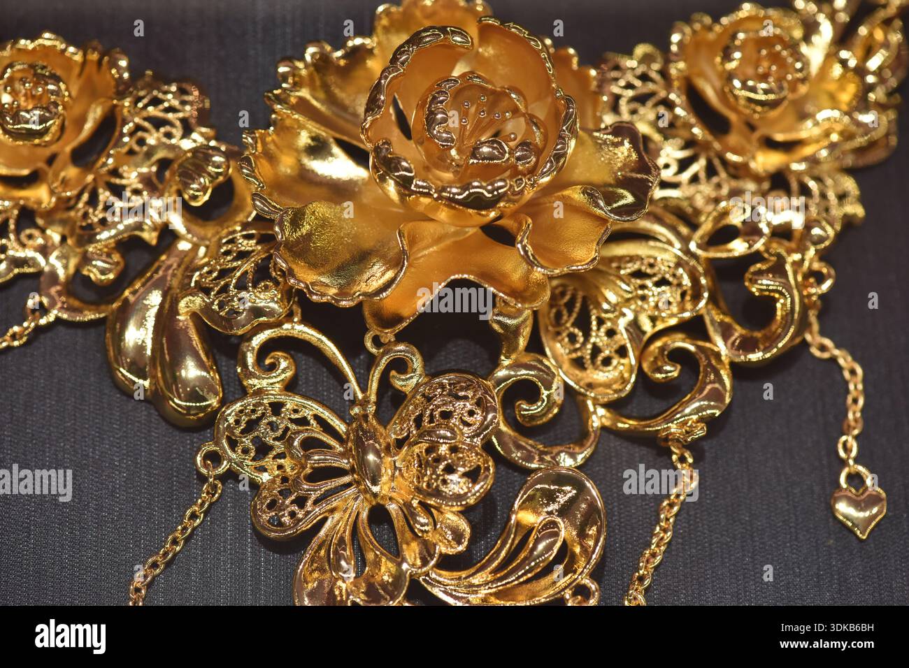 Gold jewelry being photographed in a gold shop in Fuyang City, Anhui ...