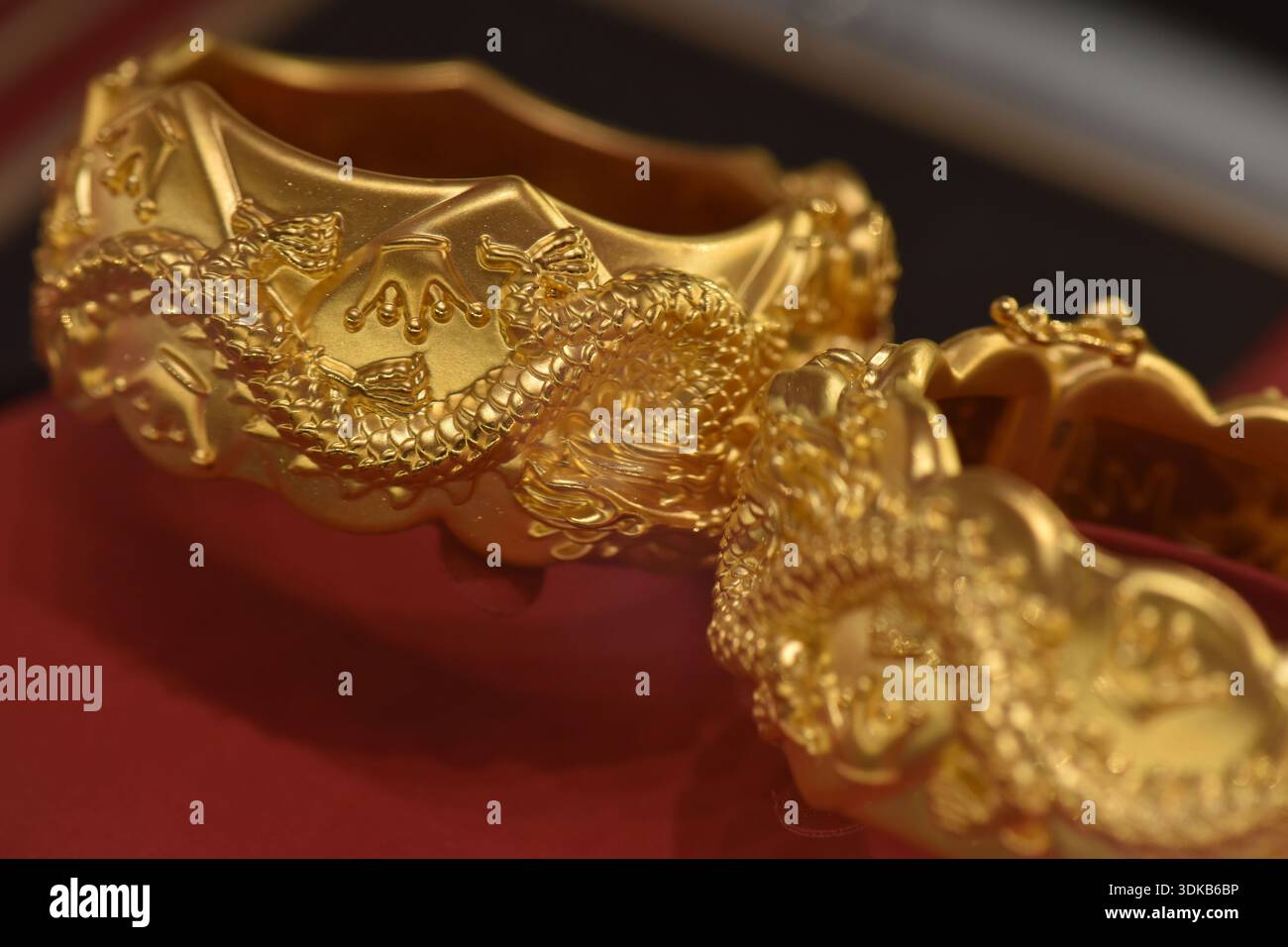 Gold jewelry being photographed in a gold shop in Fuyang City, Anhui ...