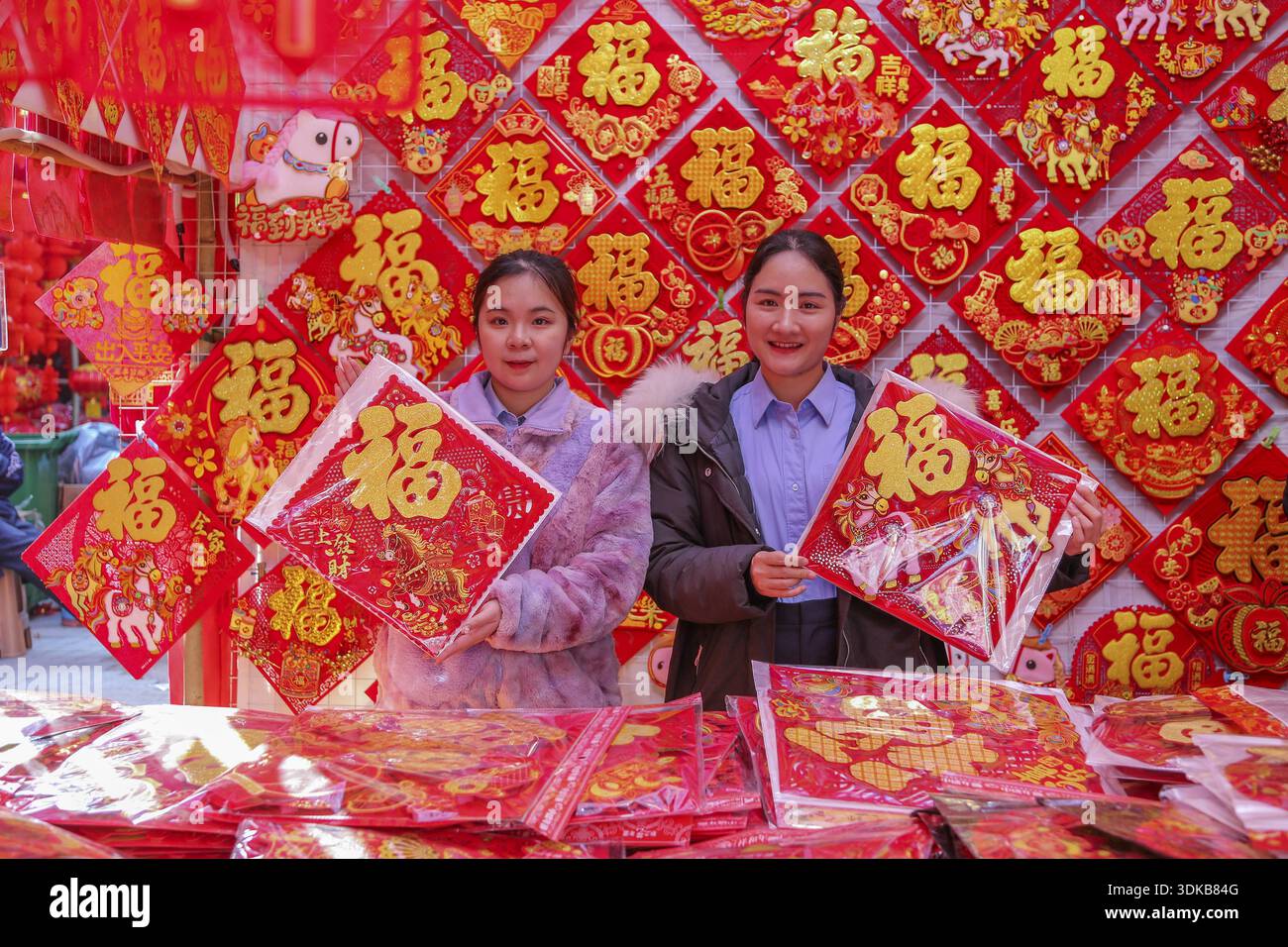 Citizens select New Year decorations at shops in Nanning City, south ...