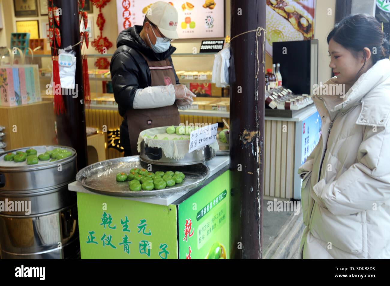 Freshly made green rice balls, a seasonal spring snack, attract ...
