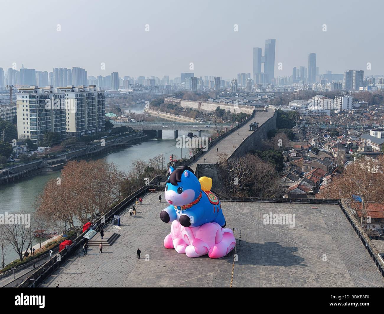 A 16-meter-tall cute blue horse statue carrying a treasure appears at ...