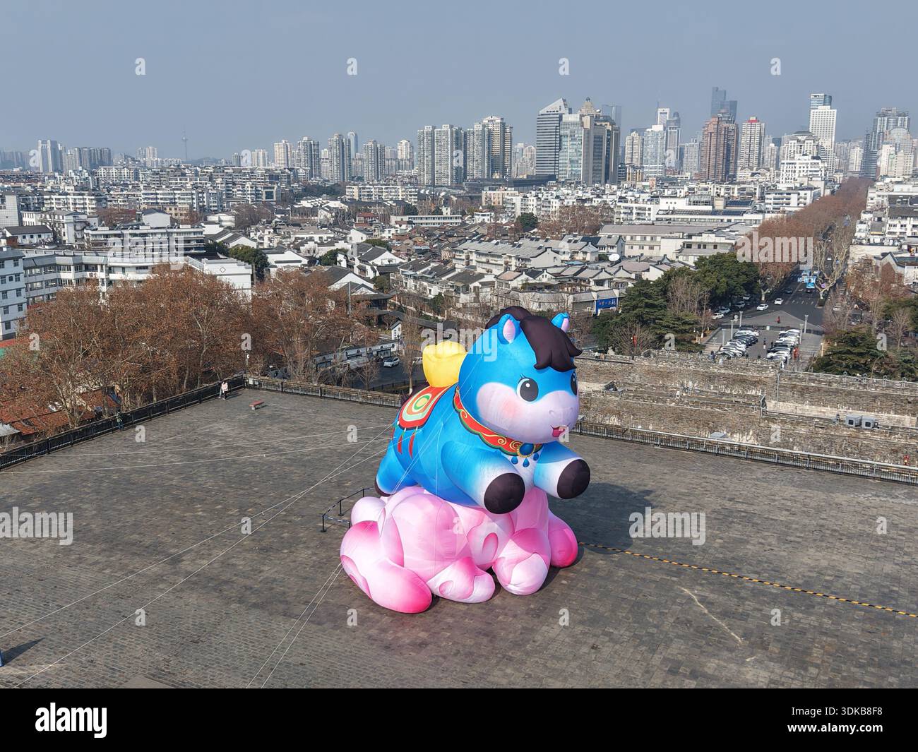 A 16-meter-tall cute blue horse statue carrying a treasure appears at ...