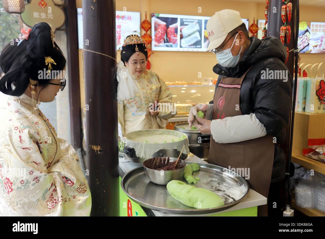 Freshly made green rice balls, a seasonal spring snack, attract ...