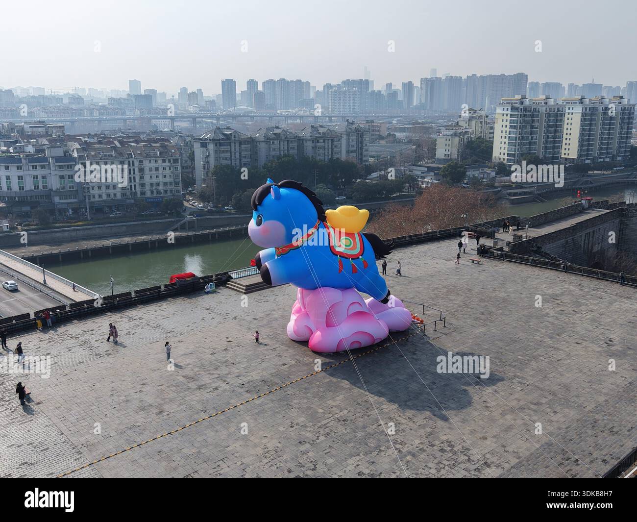 A 16-meter-tall cute blue horse statue carrying a treasure appears at ...