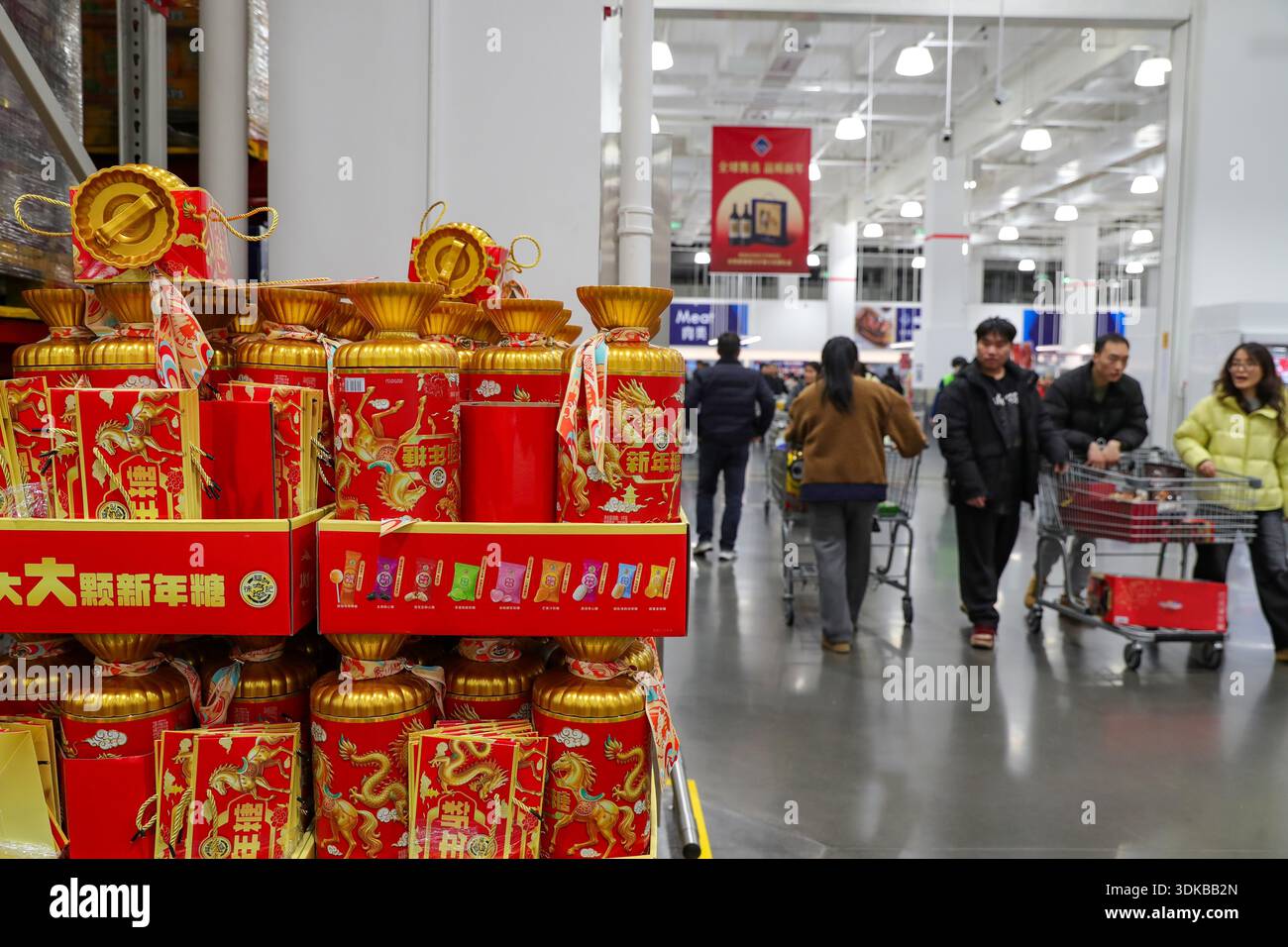 Consumers select New Year goods at a Sam's Club store in Yangzhou City ...