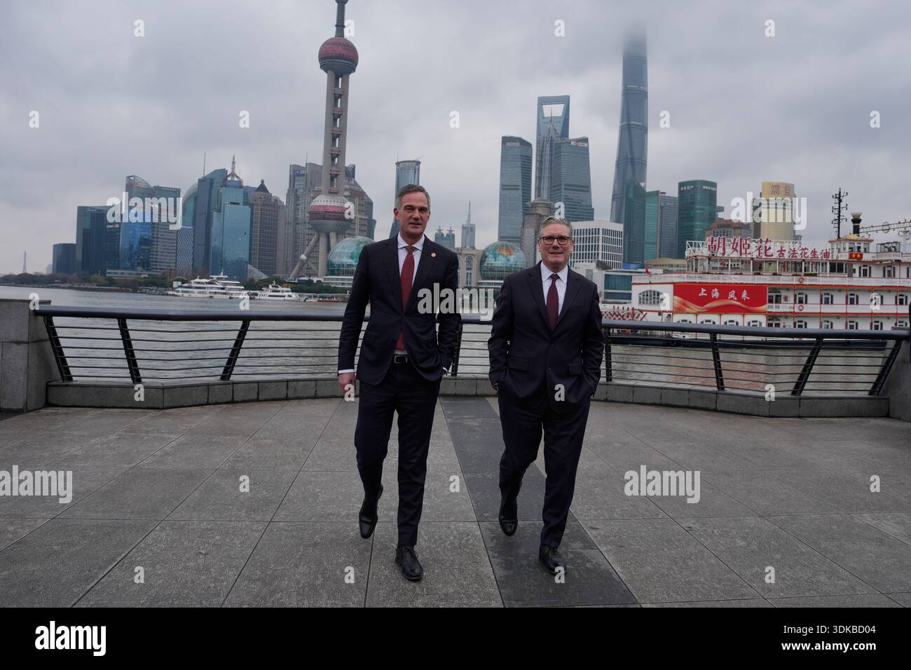 Prime Minister Sir Keir Starmer (right) walks the Shanghai Bund with ...